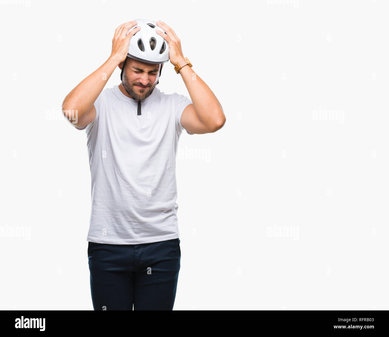 Young handsome man wearing cyclist safety helmet over isolated ...
