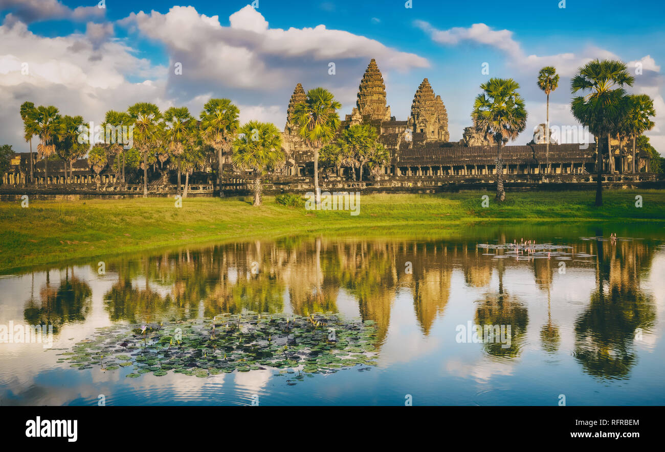 Angkor Wat temple reflecting in water of Lotus pond at sunset. Siem ...