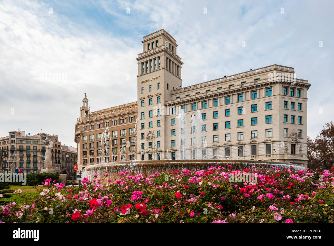 Flowers and fountain at Placa de Catalunya in Barcelona, Spain Stock ...