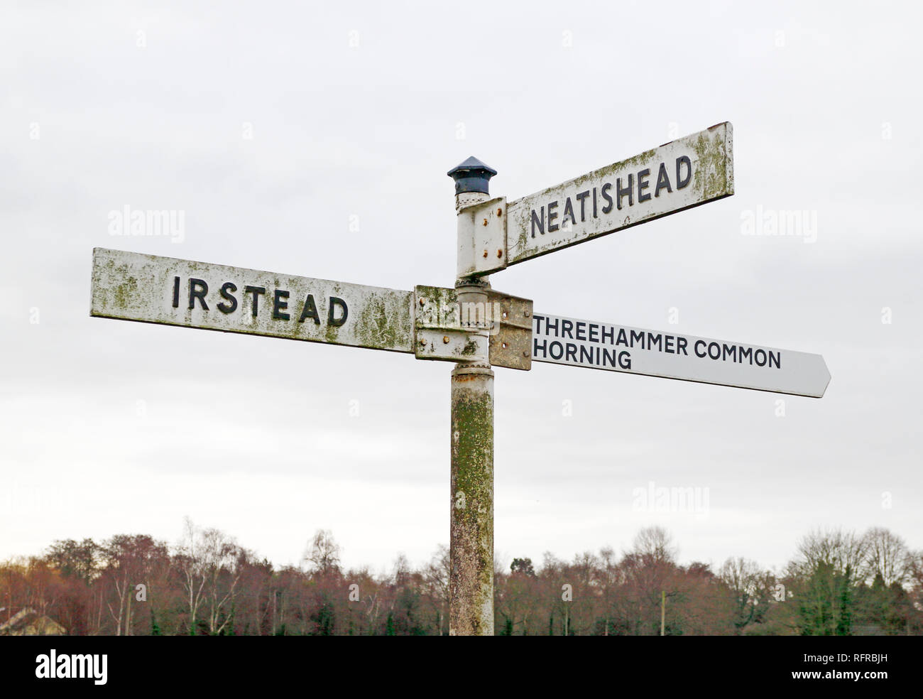 A signpost at a T-junction in the Norfolk countryside at Neatishead ...