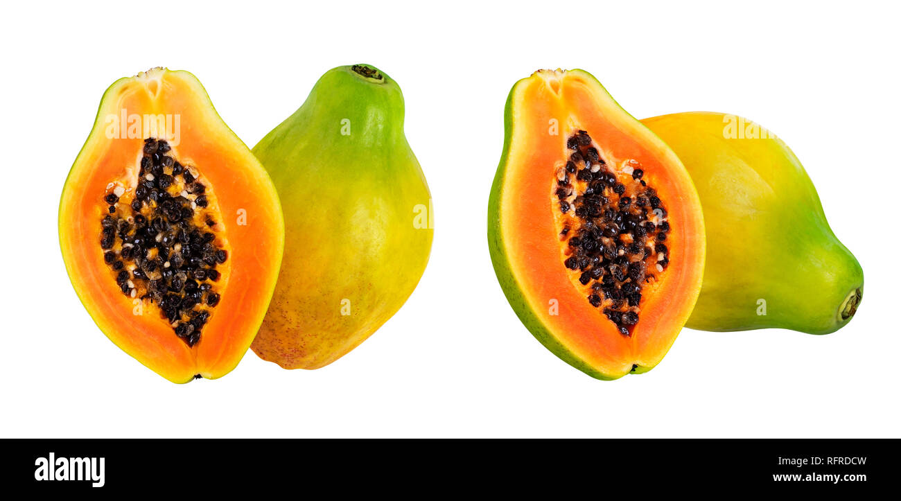 Whole and half of ripe papaya fruit isolated on white background with ...