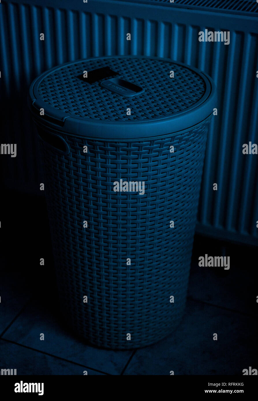 Plastic laundry basket Stock Photo - Alamy