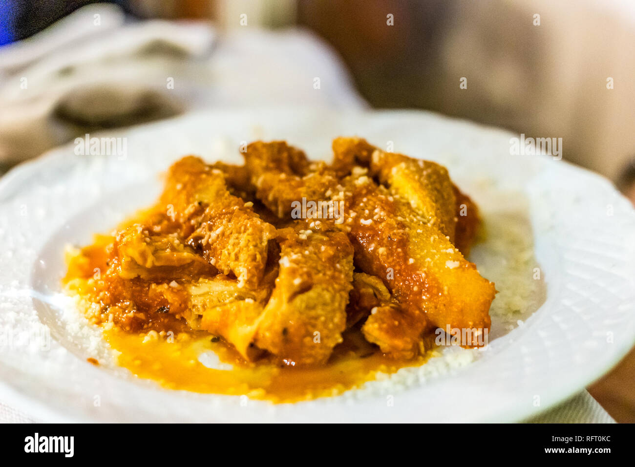 dish of typical Roman tripe in Italian restaurant Stock Photo - Alamy