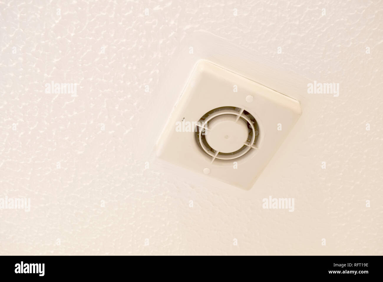 Ceiling extract fan on white plaster for kitchen or bathroom Stock ...