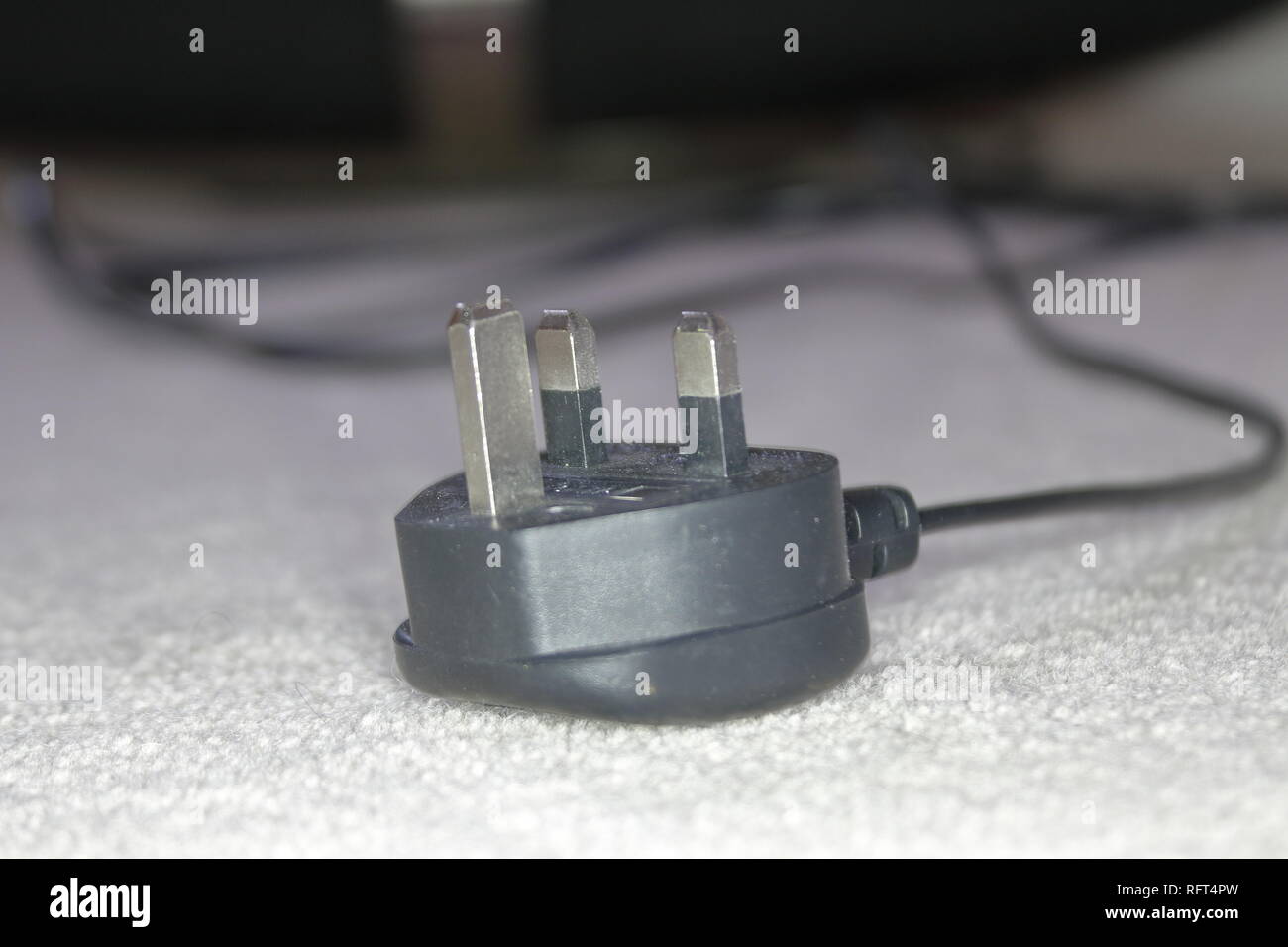 uk 3 pin electric power plug and cable Stock Photo - Alamy