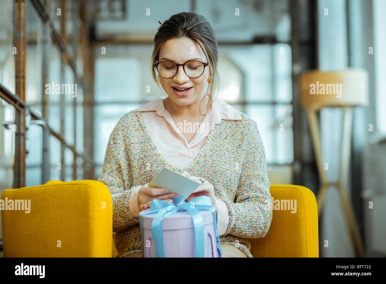 Beautiful young woman opening box hi-res stock photography and images ...