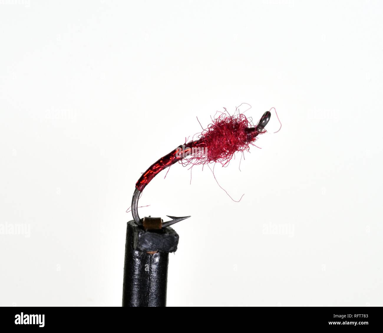 Red Princess nymph trout fly Stock Photo - Alamy