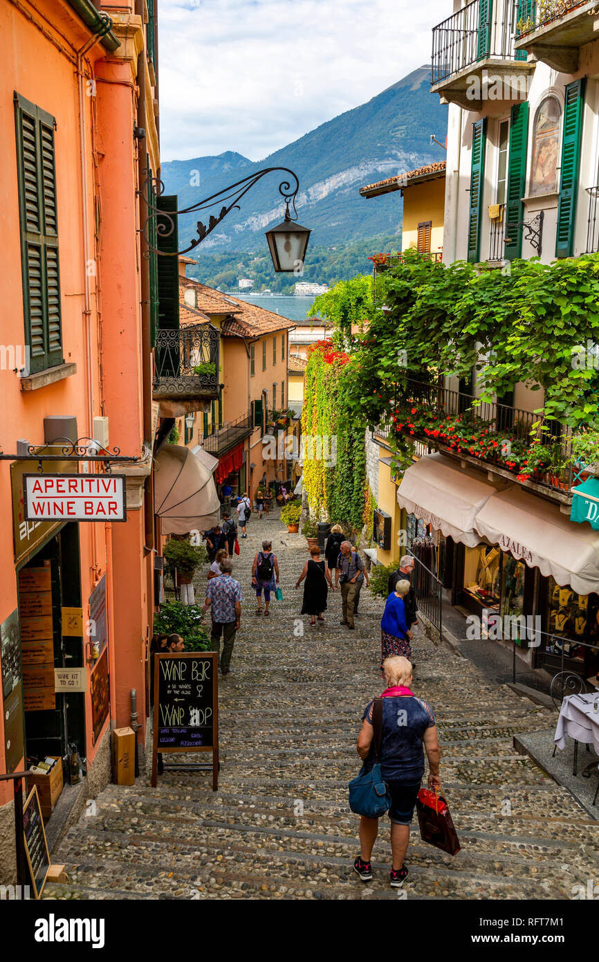 View of shops on cobbled street in Bellagio, Province of Como, Lake ...