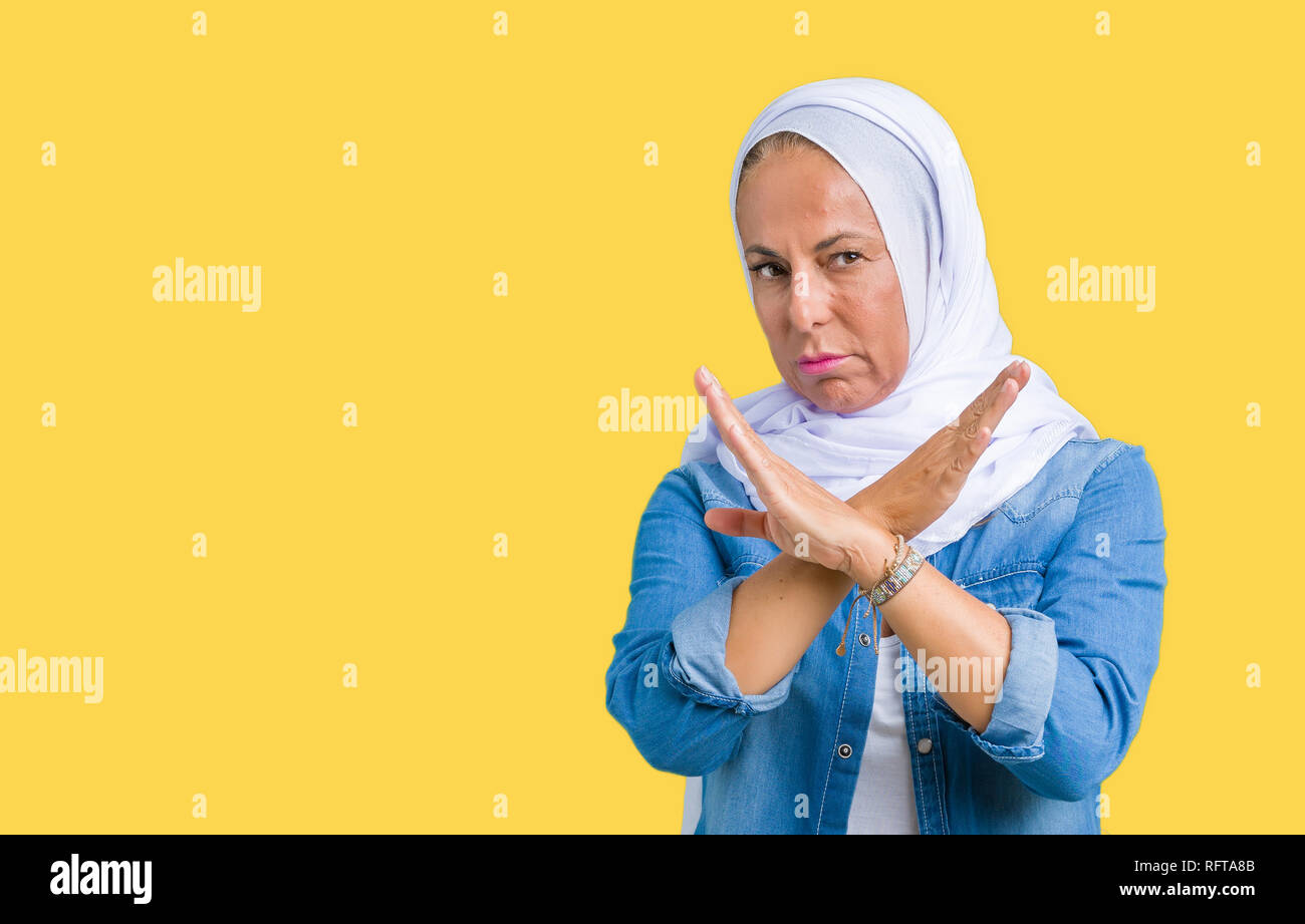 Middle age eastern arab woman wearing arabian hijab over isolated ...