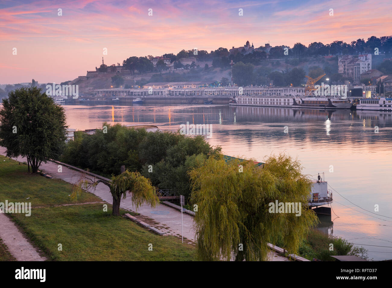View of floating bars and nightclubs on Sava River across to Victor ...