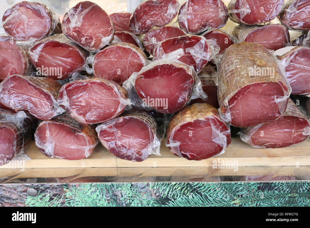 many smoked cold cuts for sale at italian kiosk Stock Photo - Alamy
