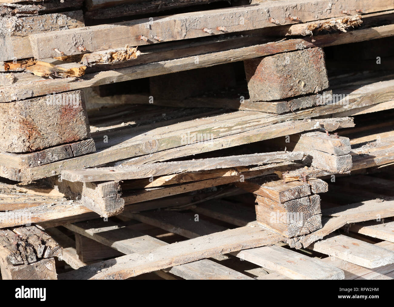 detail of the wooden planks of many old pallets used to transport the ...
