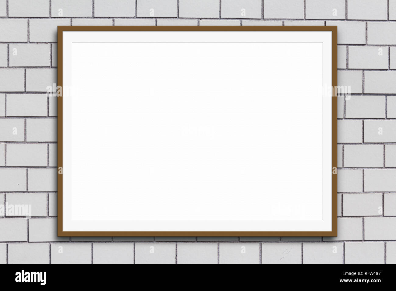 blank information sign, framed mockup on white tiled wall Stock Photo ...