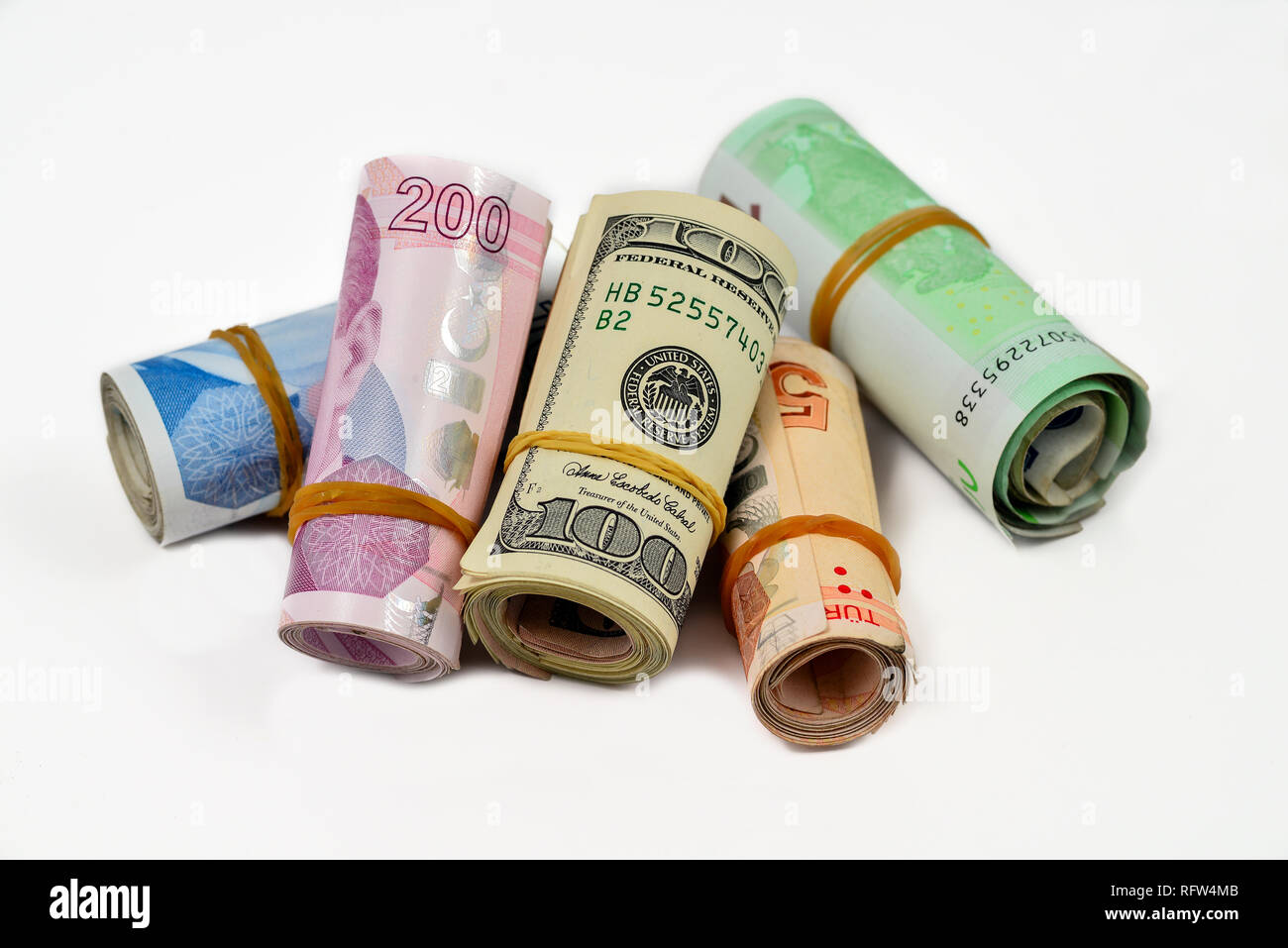 Roll of paper coins, on white background Stock Photo - Alamy
