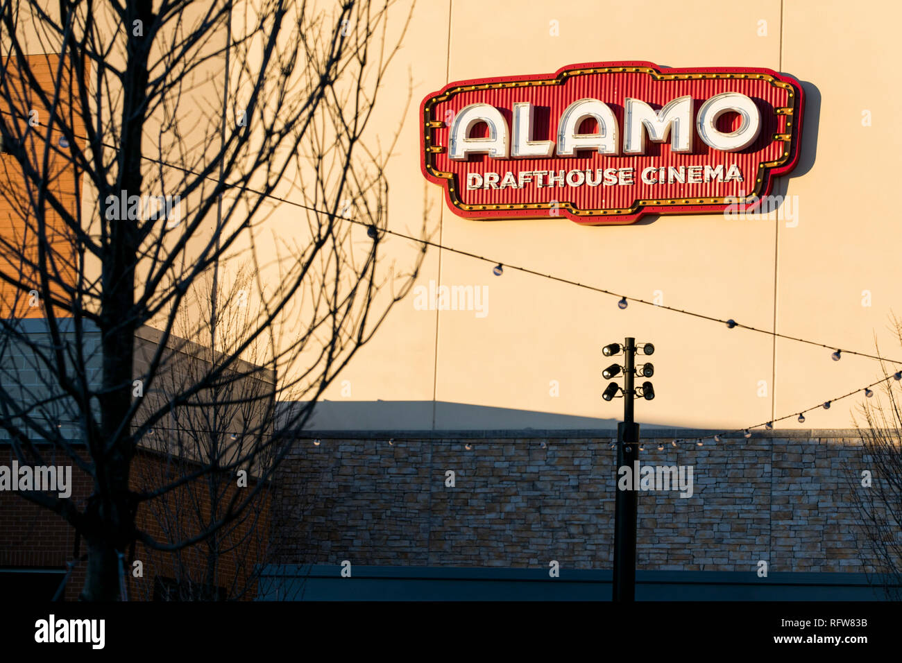 A logo sign outside of an Alamo Drafthouse Cinema location in ...