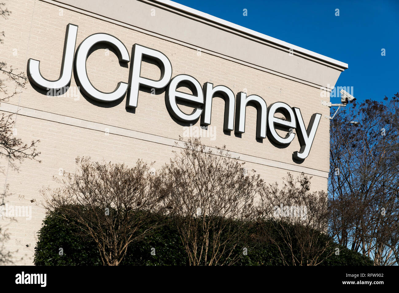 A logo sign outside of a JCPenney retail store location in Frederick ...