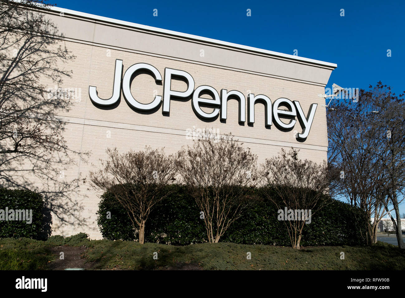 A logo sign outside of a JCPenney retail store location in Frederick ...