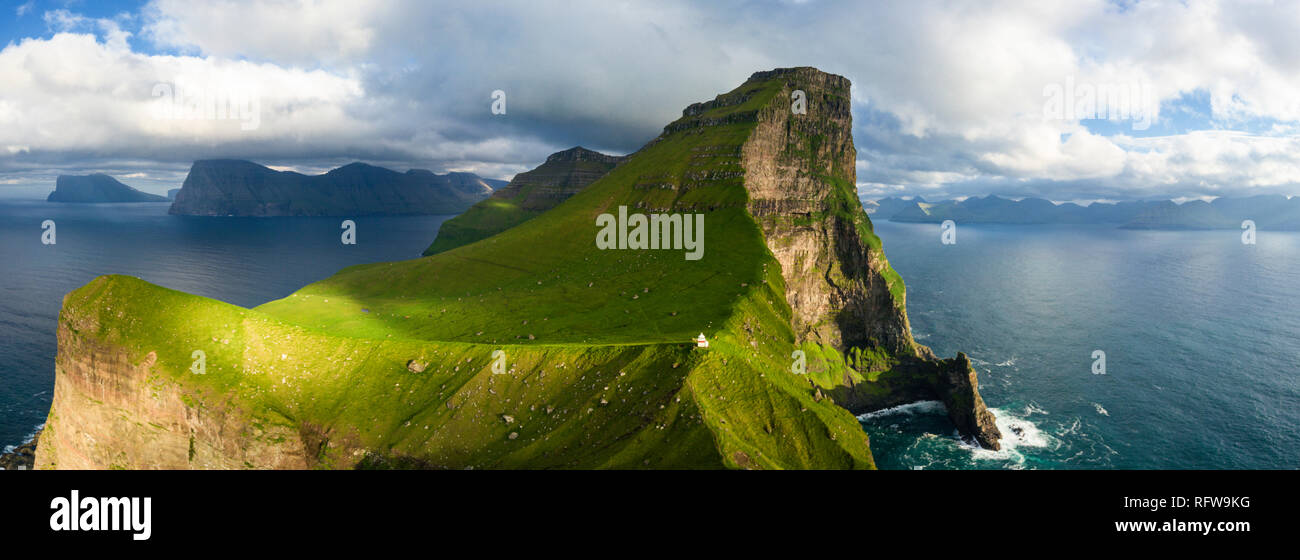 Aerial panoramic of Kallur lighthouse, Kalsoy island, Faroe Islands ...