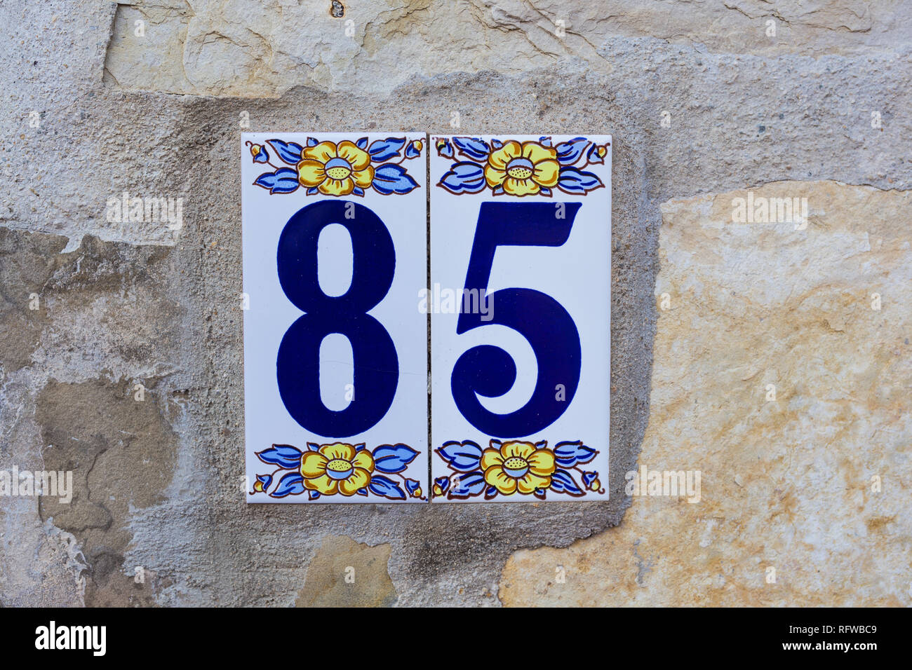 Enamel ceramic house number eighty five close-up Stock Photo - Alamy