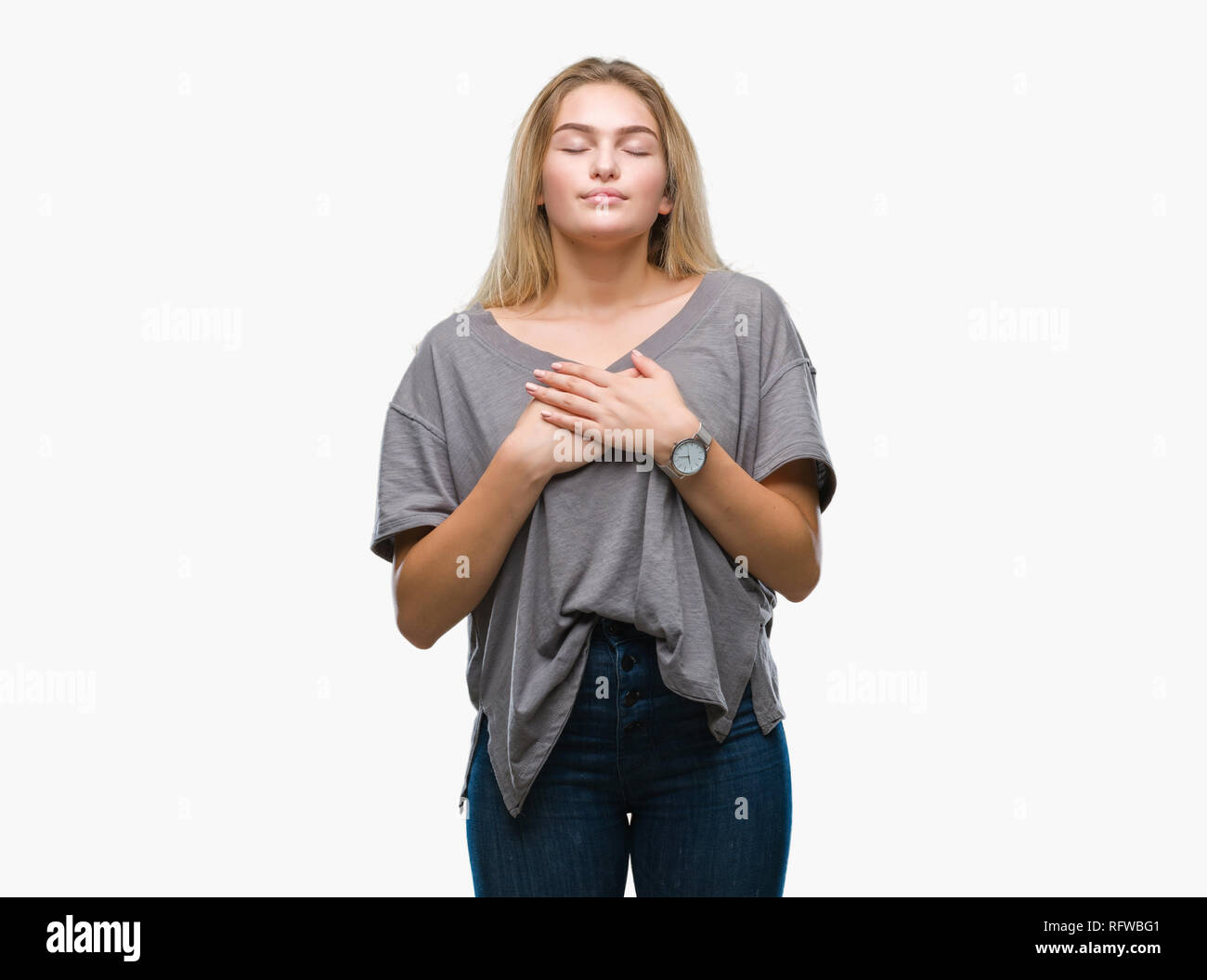 Young caucasian woman over isolated background smiling with hands on ...