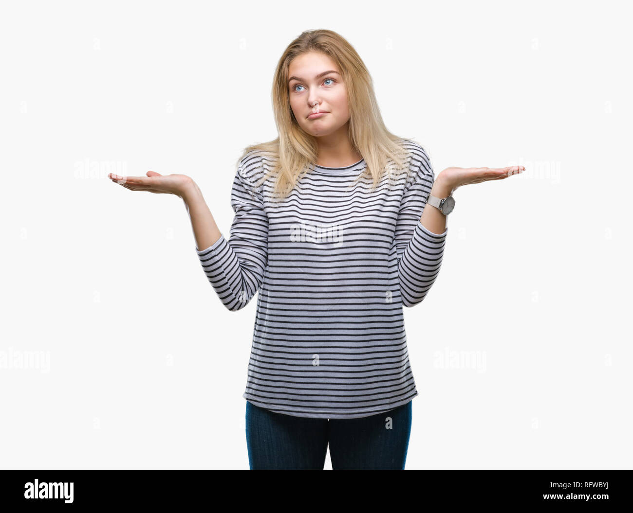 Young caucasian woman over isolated background clueless and confused ...