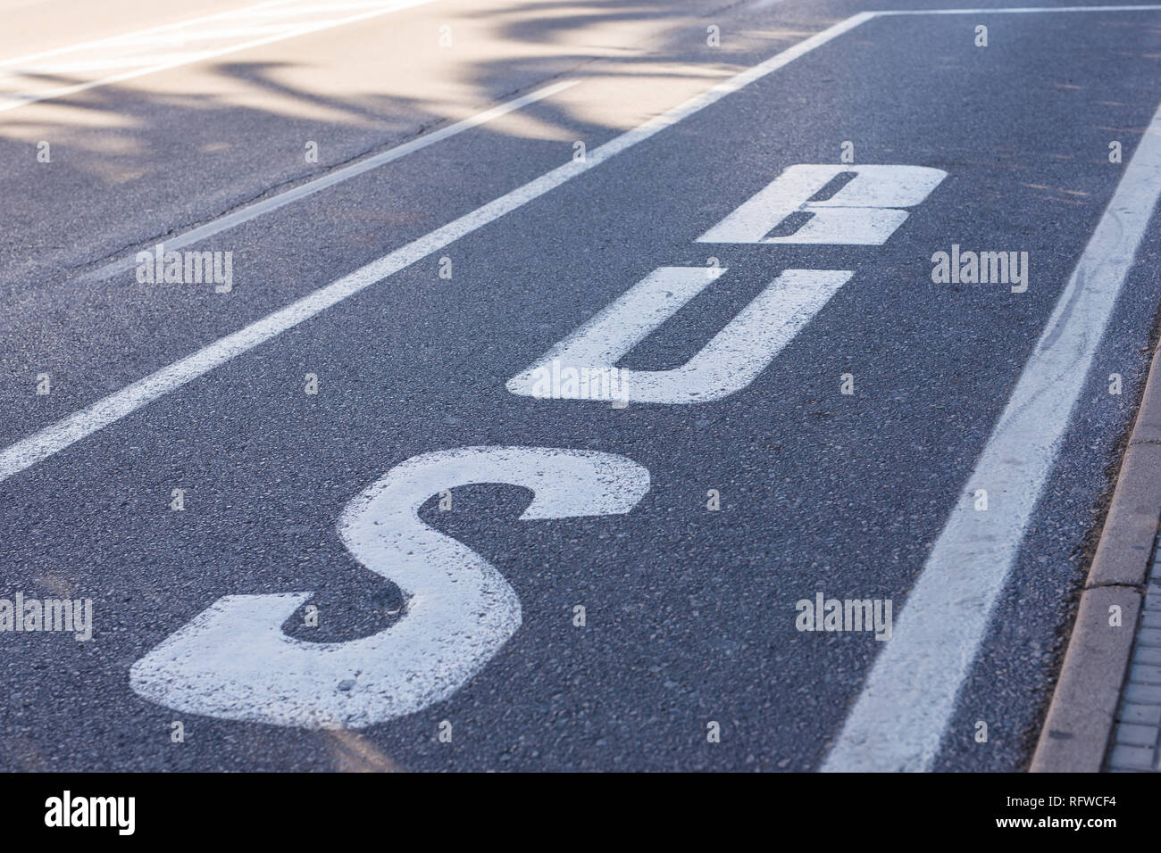 Sign on road bus, detail of a sign painted on the asphalt, information ...