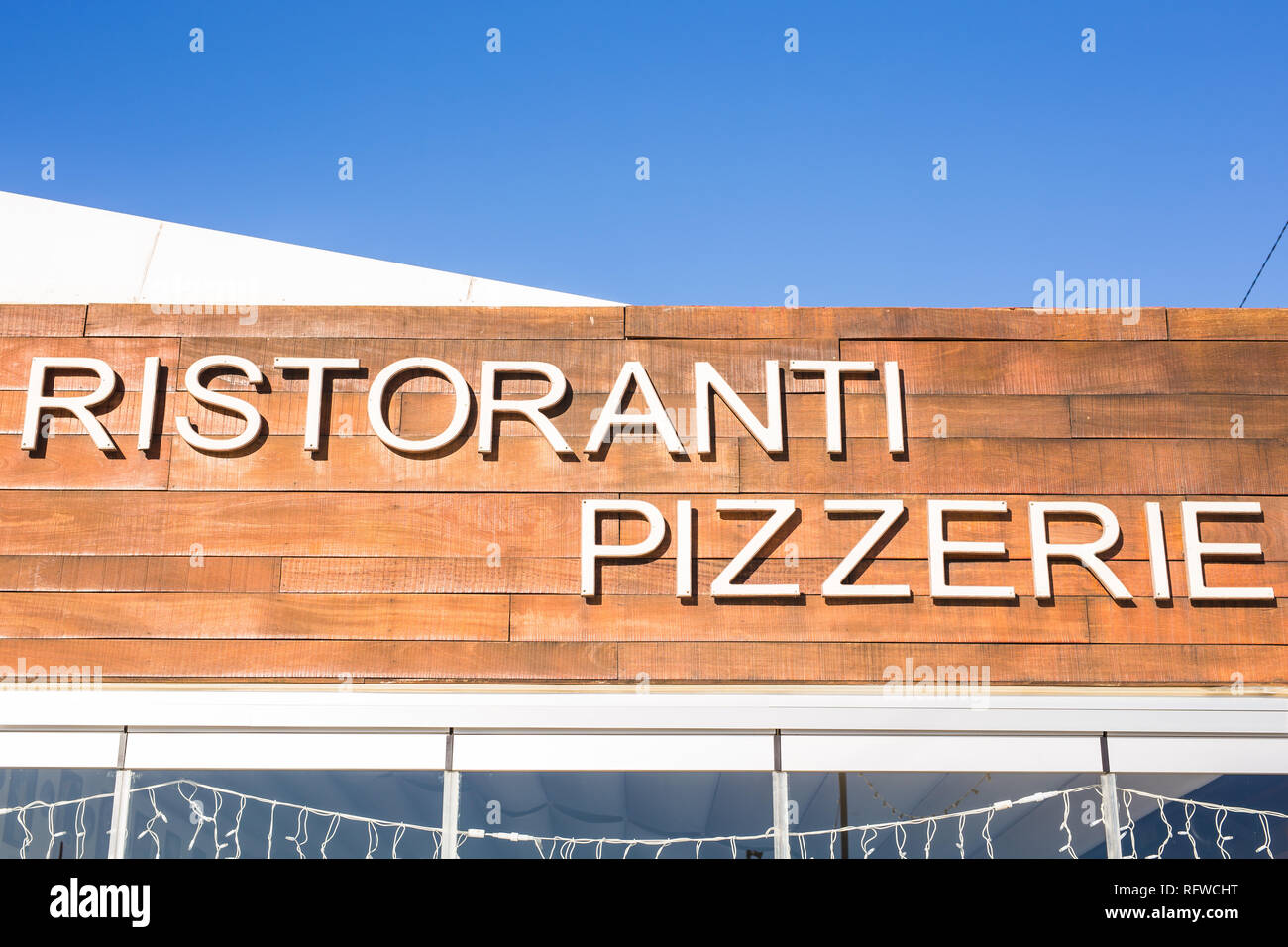 Food, cafe and signboard concept - Pizzeria sign on restaurant Stock ...