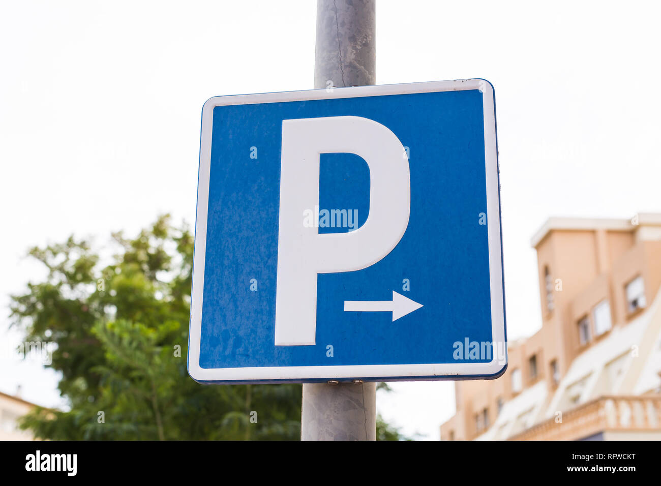 Parking sign showing free places. Sign on a pole Stock Photo - Alamy