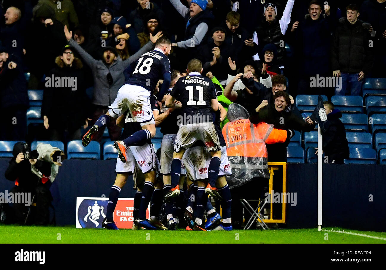 Millwall's Jake Cooper (obscured) celebrates scoring his side's second ...