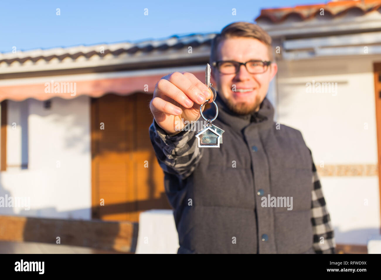 Dwelling, buying home, real estate and ownership concept - handsome man ...
