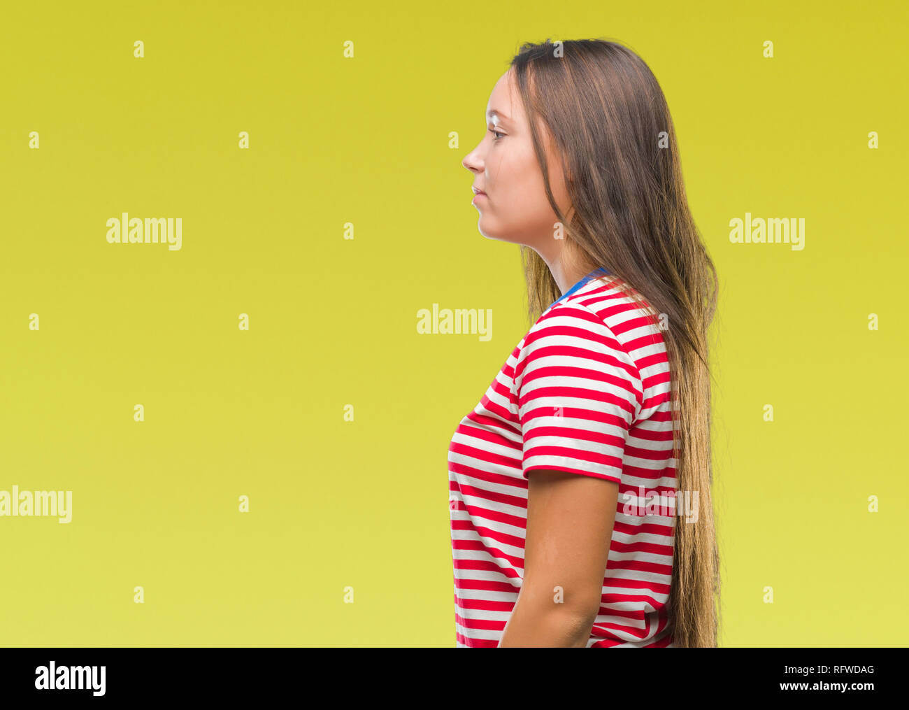 Young caucasian beautiful woman over isolated background looking to ...