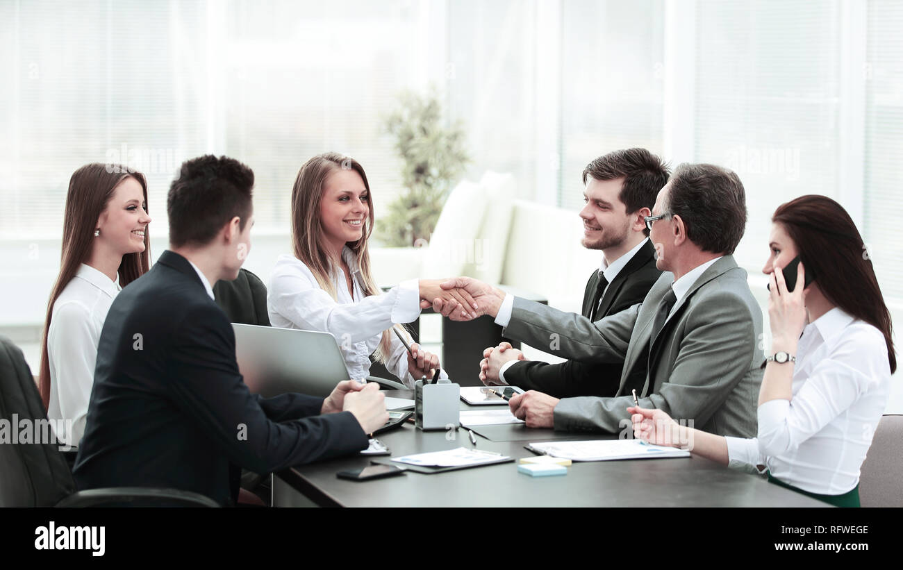 business partners shaking hands after a successful transaction Stock ...