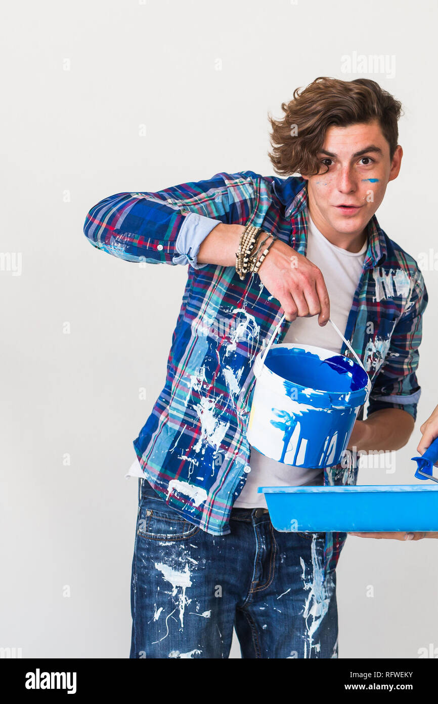 People, renovation and redecoration concept - portrait of handsome ...
