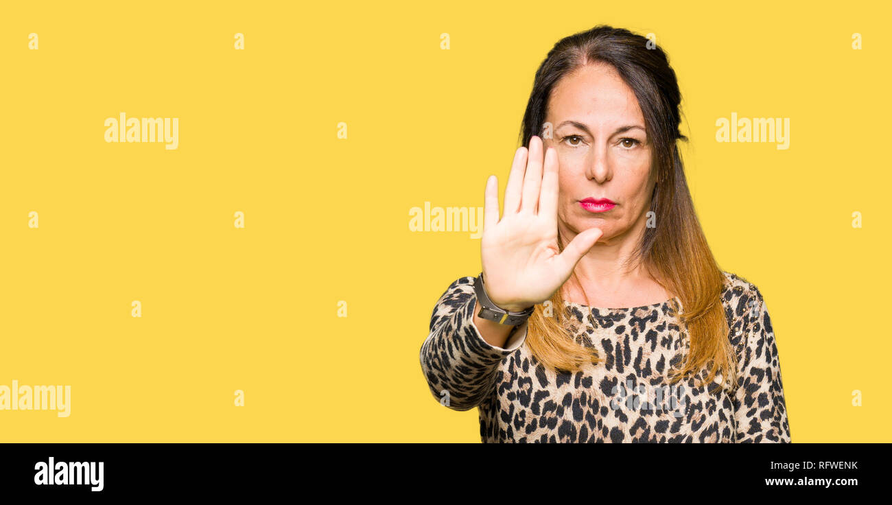 Beautiful middle age woman wearing leopard animal print dress doing ...
