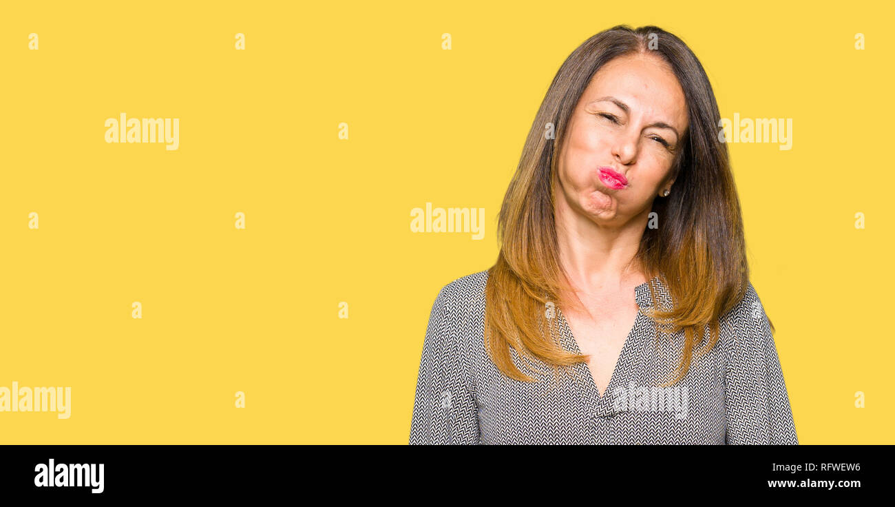 Puffed cheeks woman hi-res stock photography and images - Alamy