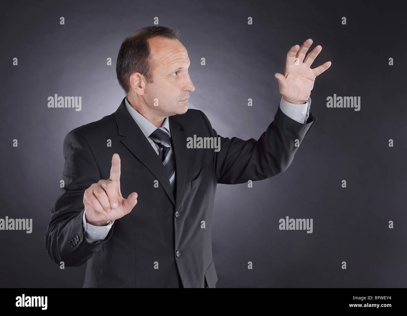 Businessman looking futuristic business interface hi-res stock ...
