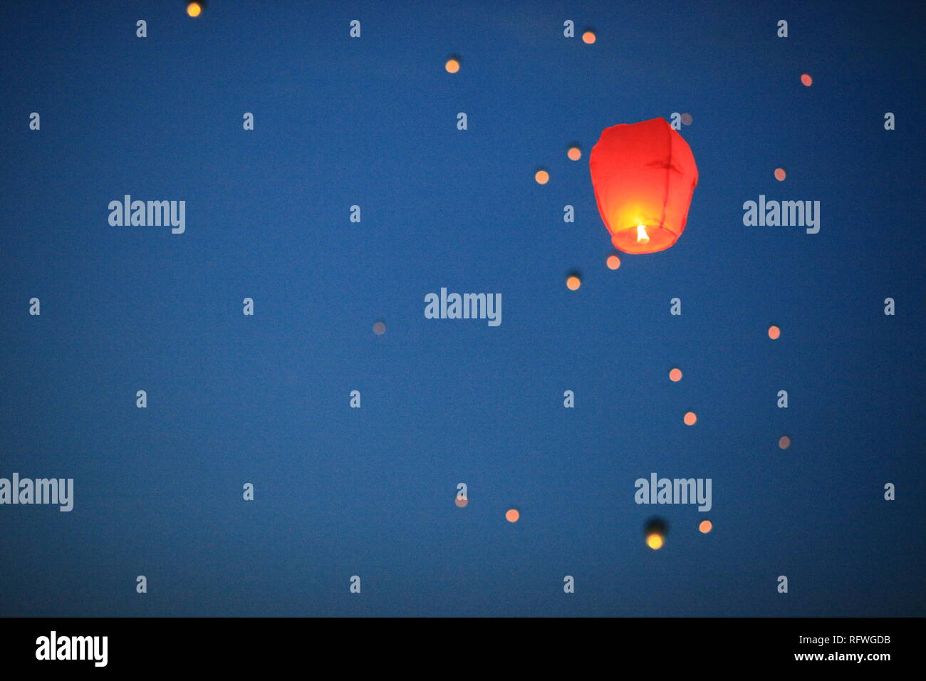 The Chinese lantern flies up highly in the sky Stock Photo - Alamy