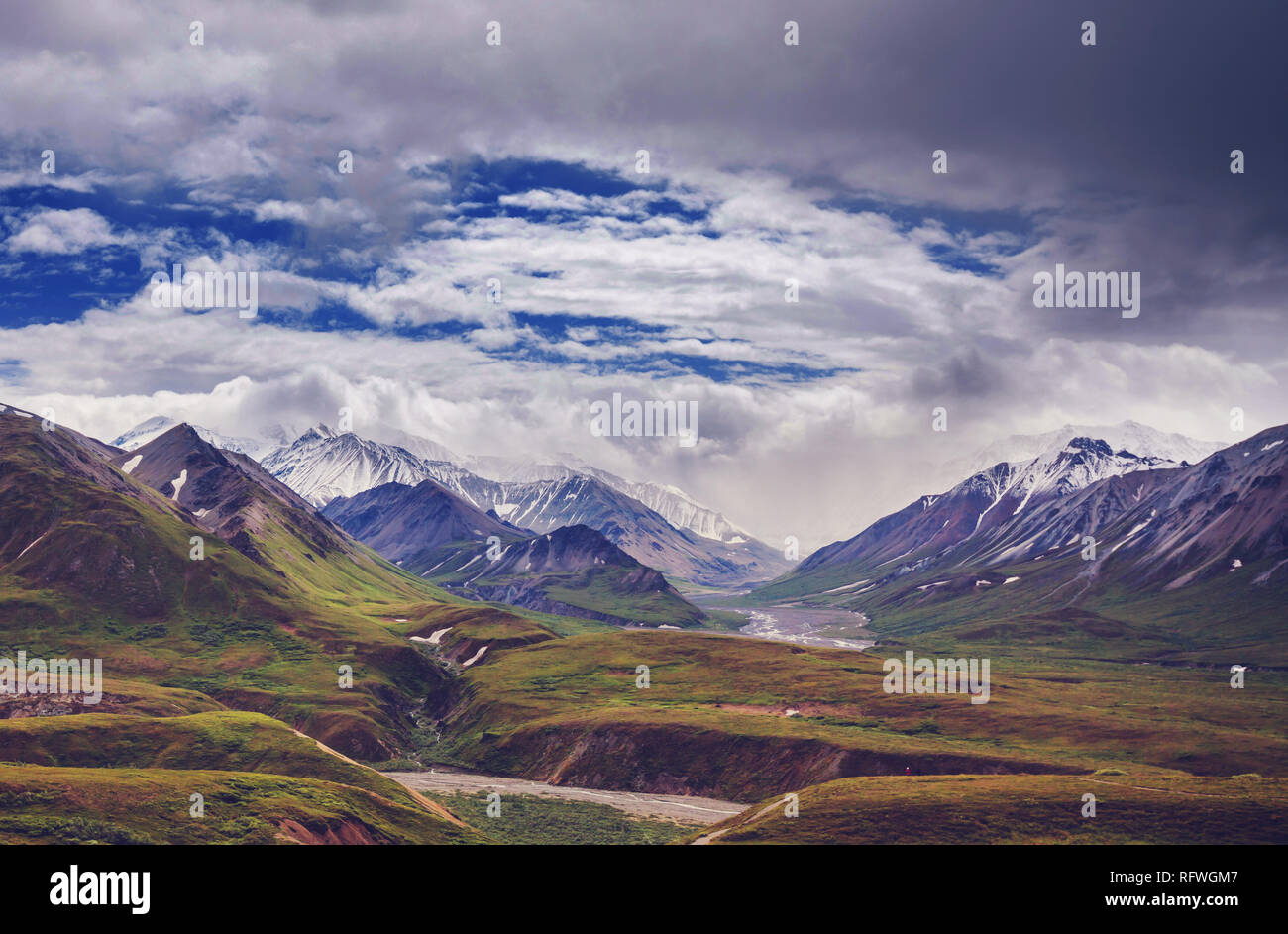 Picturesque Mountains of Alaska in summer. Snow covered massifs ...