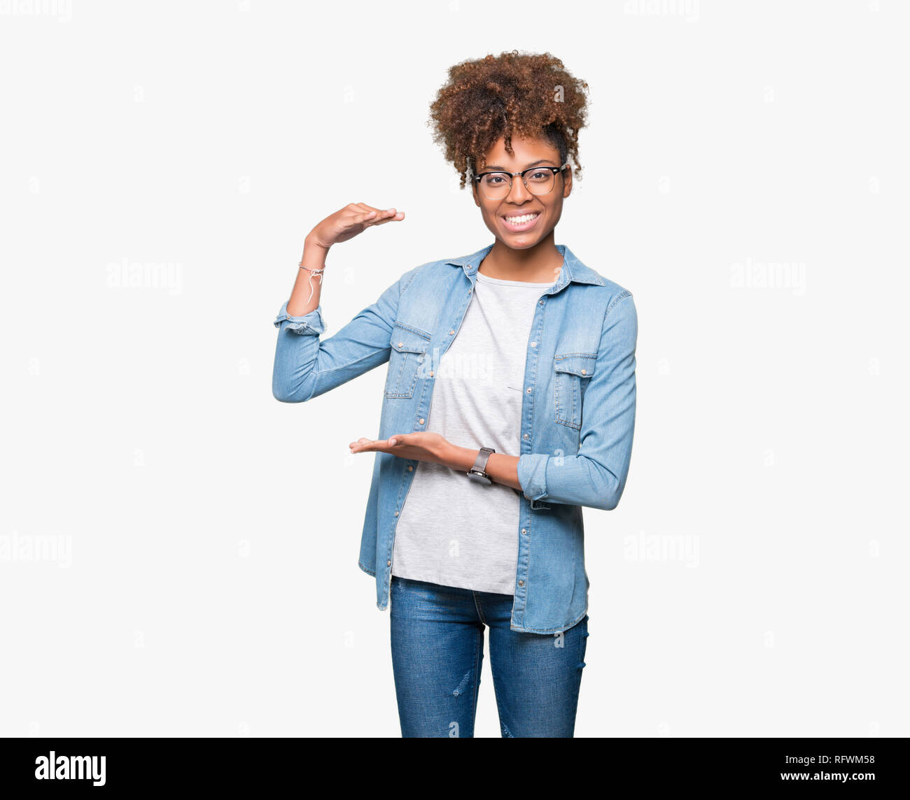 Beautiful young african american woman wearing glasses over isolated ...