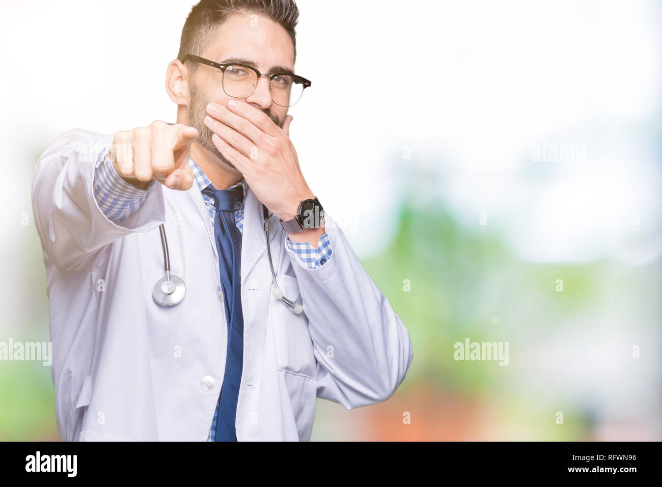 Man doctor laughing pointing finger hi-res stock photography and images ...
