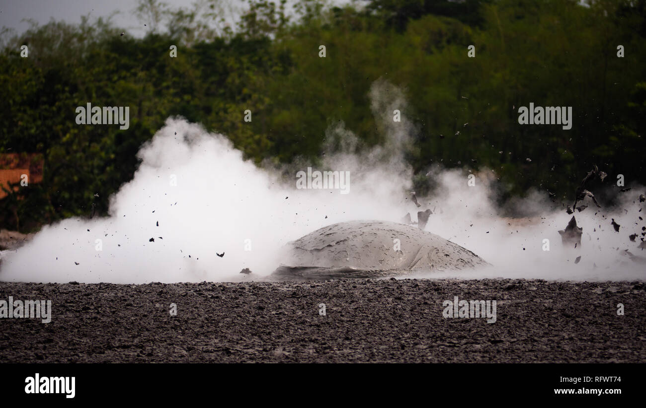 mud volcano with bursting bubble bledug kuwu. volcanic plateau with ...