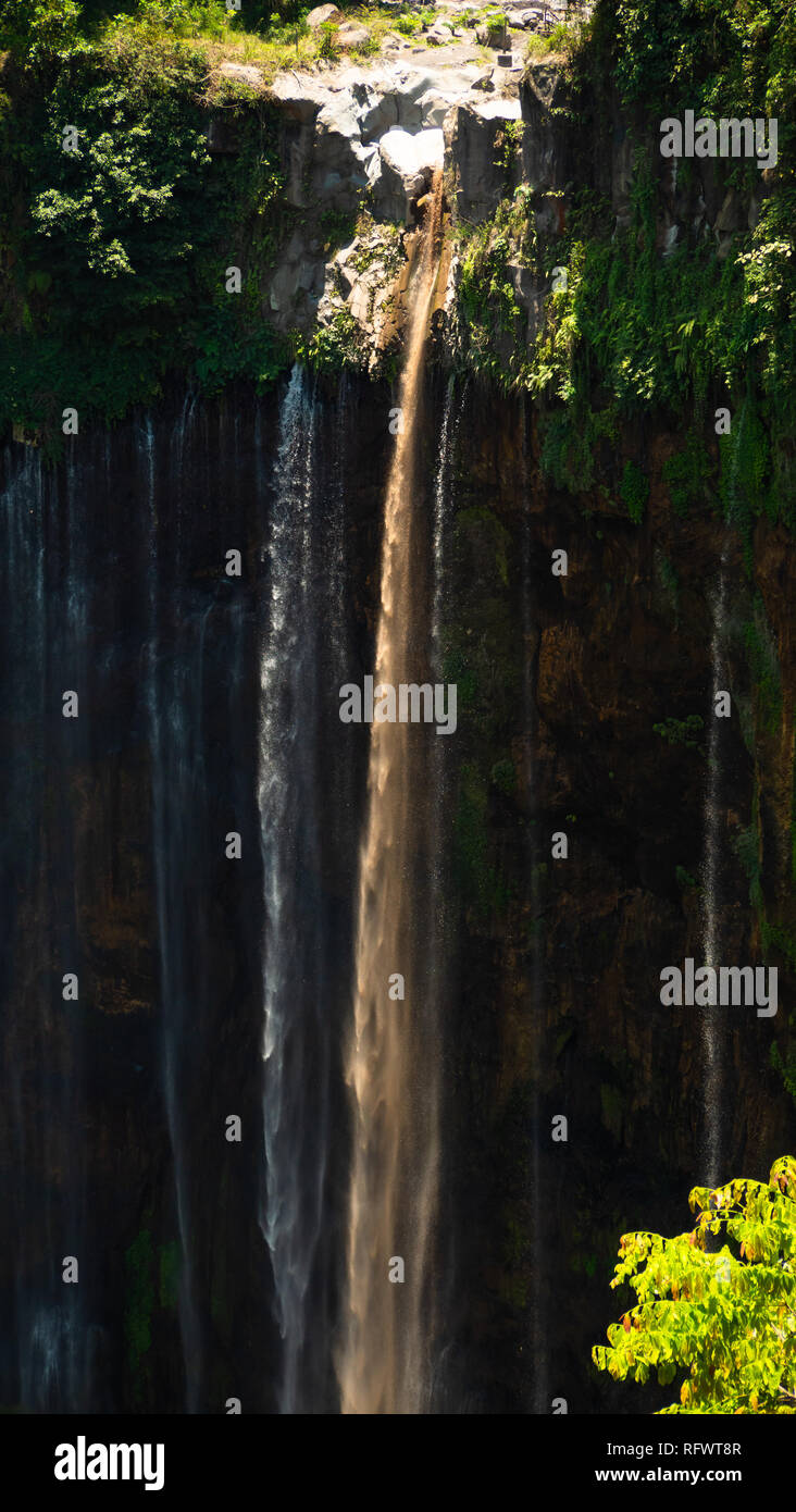 waterfall coban sewu in Java, indonesia. waterfall in tropical forest ...