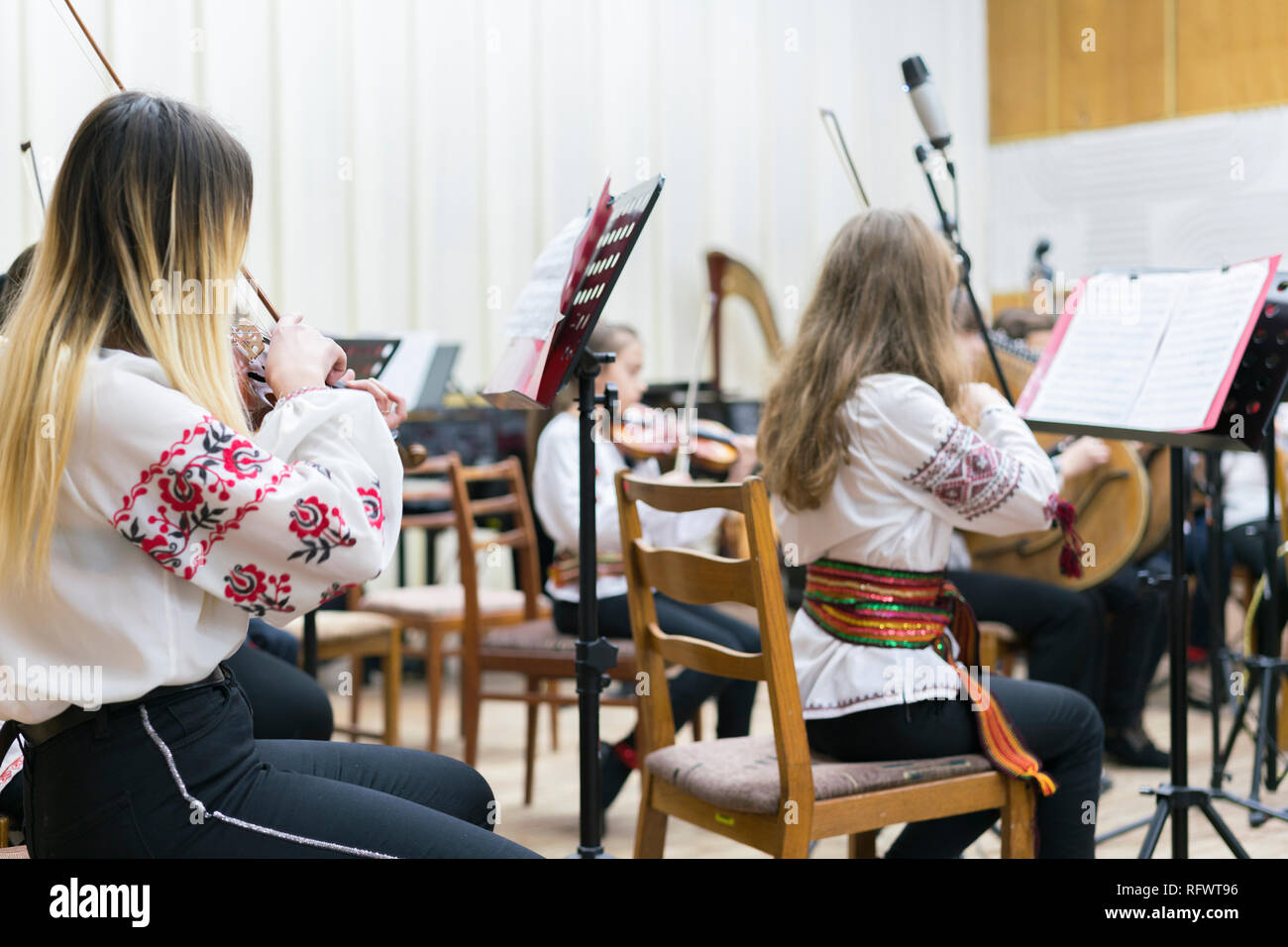 violin ensemble on stage Stock Photo - Alamy