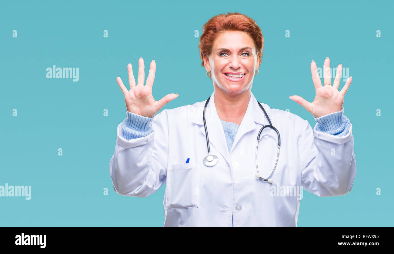 Senior caucasian doctor woman wearing medical uniform over isolated ...