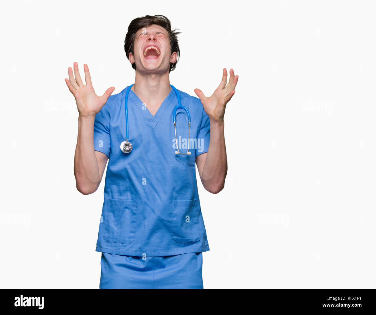 Young doctor wearing medical uniform over isolated background ...