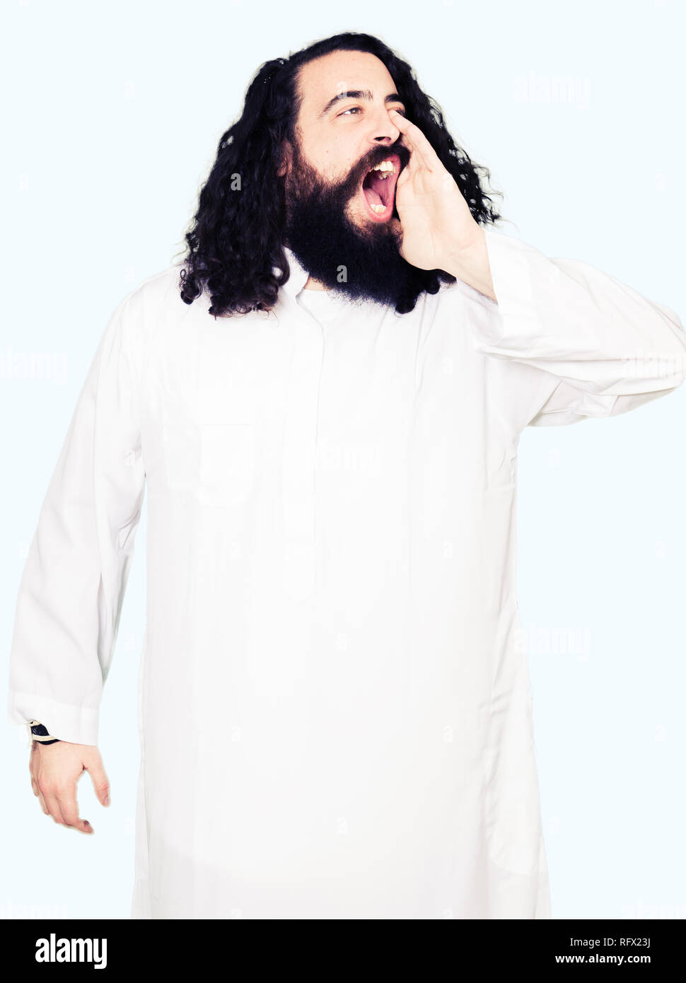 Man wearing Jesus Christ costume shouting and screaming loud to side ...