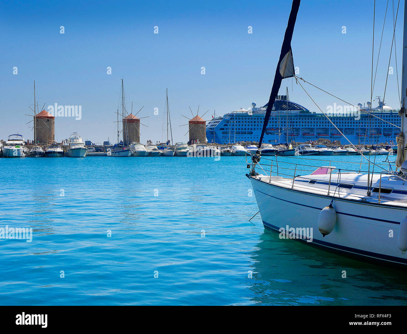 Mandraki Harbour the ancient harbour of the island of Rhodes in Greece ...