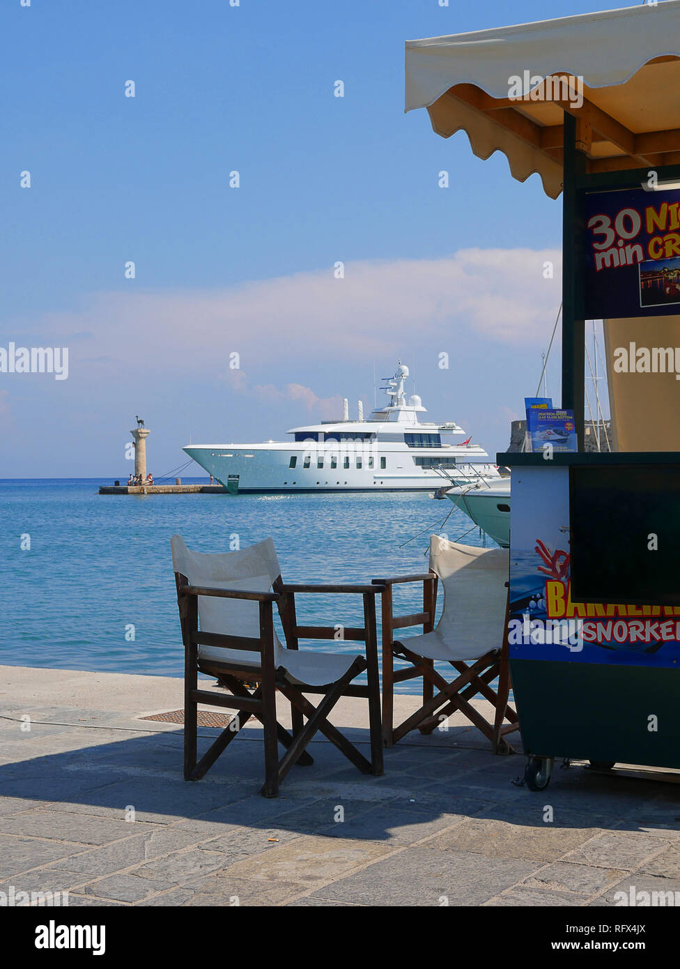 Mandraki Harbour the ancient harbour of the island of Rhodes in Greece ...