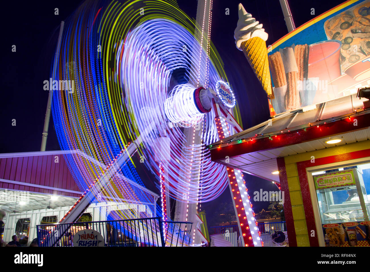 Spinning carnival ride hi-res stock photography and images - Alamy