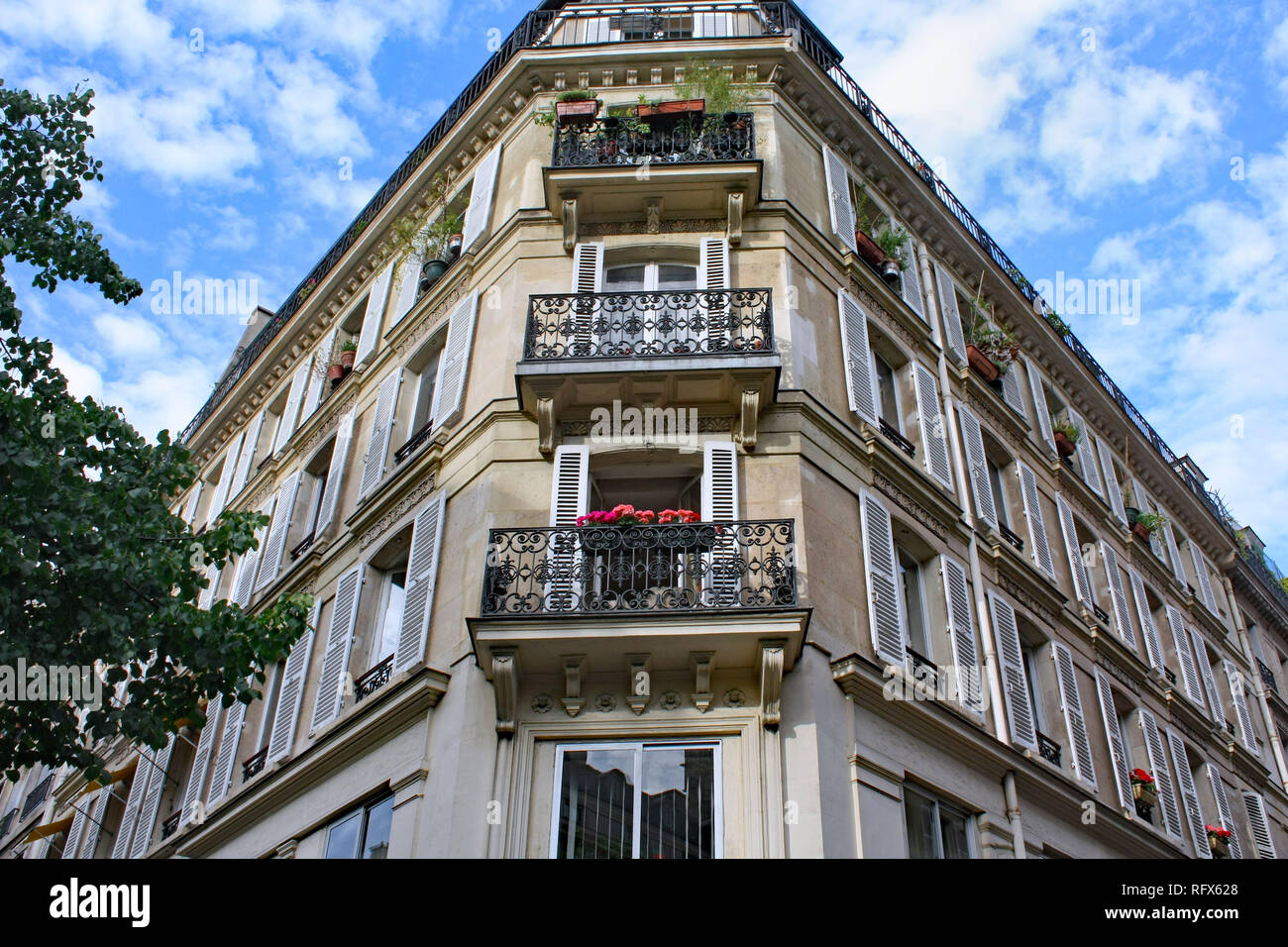 Paris, modern apartment building with flowers on balconies Stock Photo ...